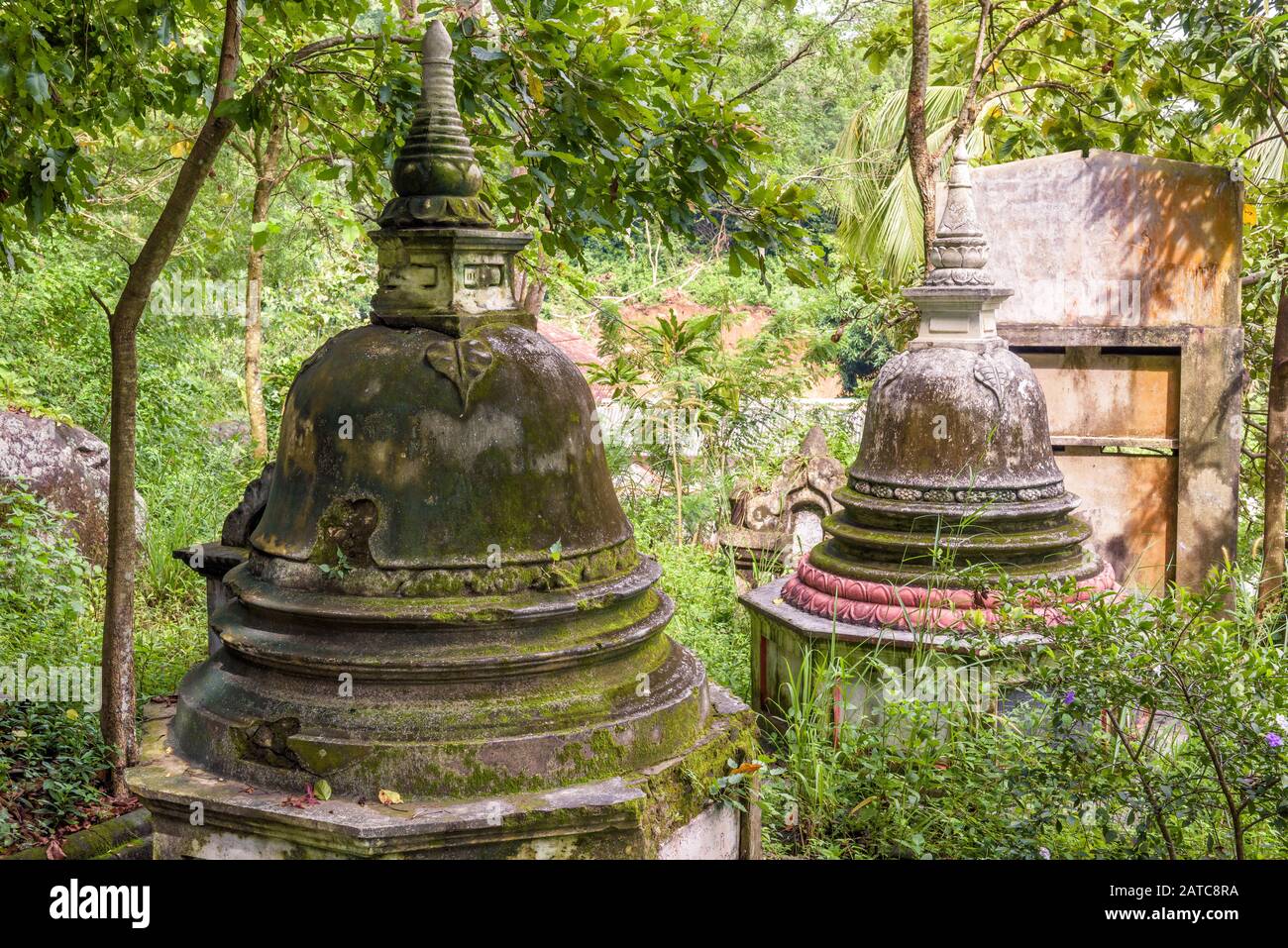 Ancient Buddhist stupas in Mulkirigala Raja Maha Vihara rock temple in ...