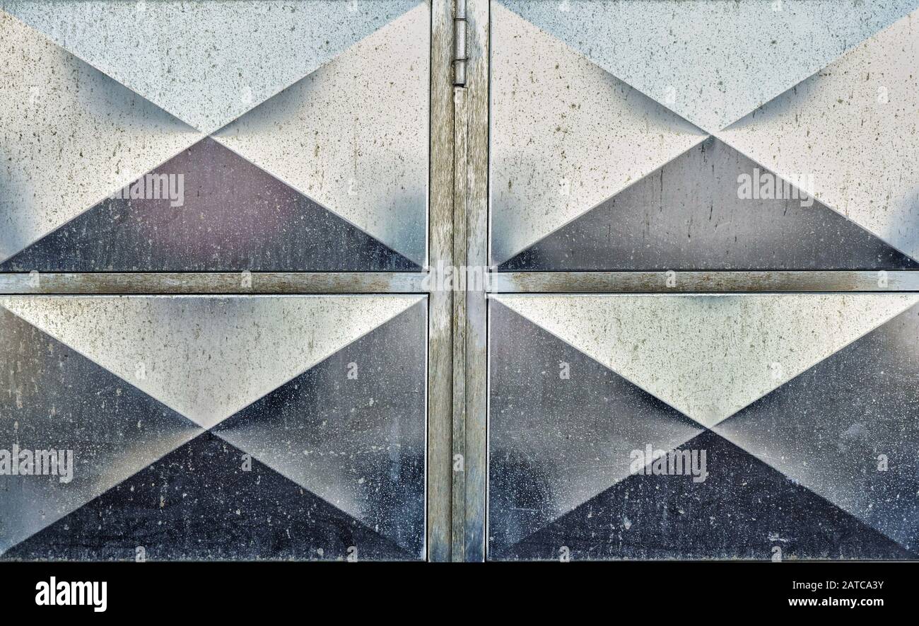 Unpainted panelled steel garage door hi-res stock photography and ...