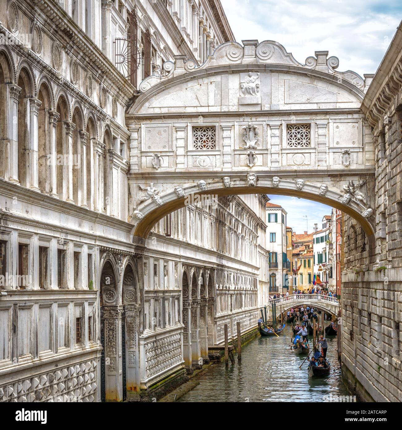 Venice, Italy - May 21, 2017: Gondolas with tourists sails on old canal ...