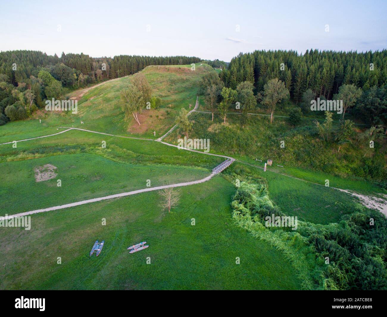A beautiful sunny view of the forest, fields and river from above ...