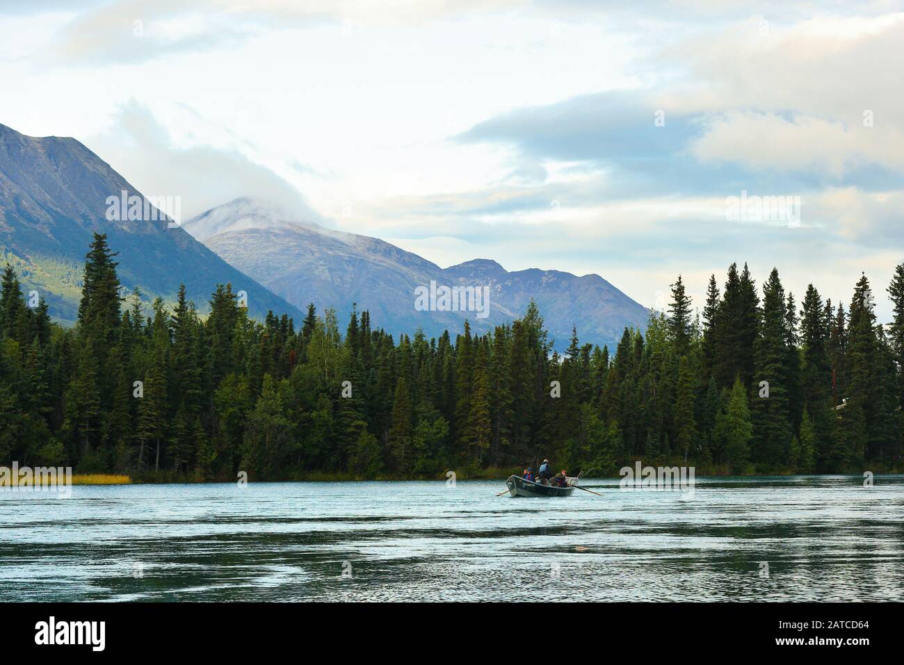 Tourists doing boat fishing on the Kenai River at early morning ...