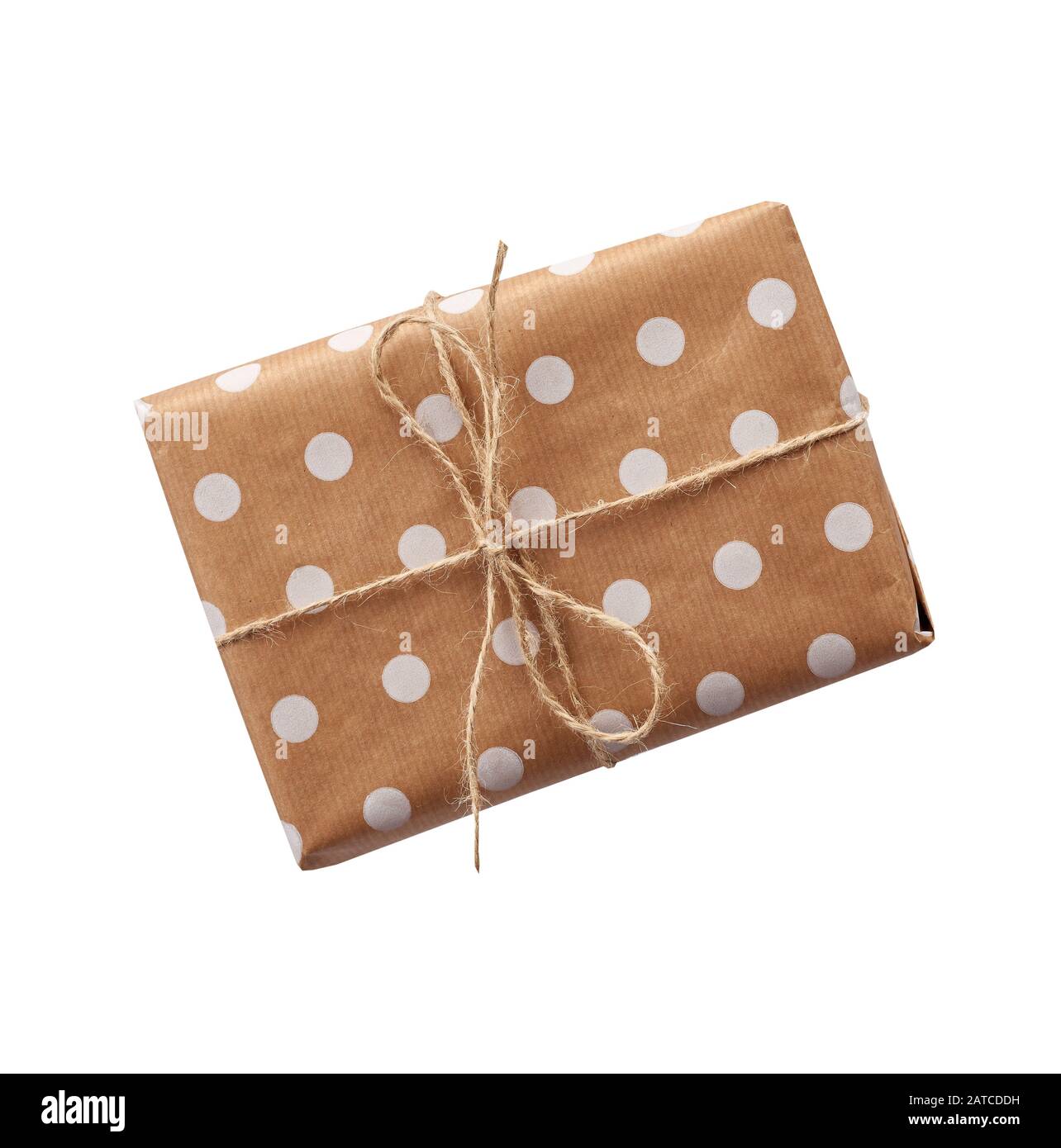 gift in box wrapped in brown kraft paper and tied with rope on a white ...