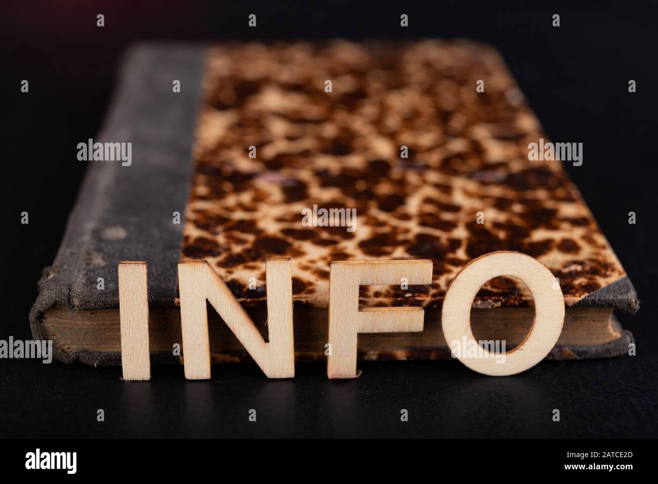 The word info arranged from wooden letters on the background of the old ...