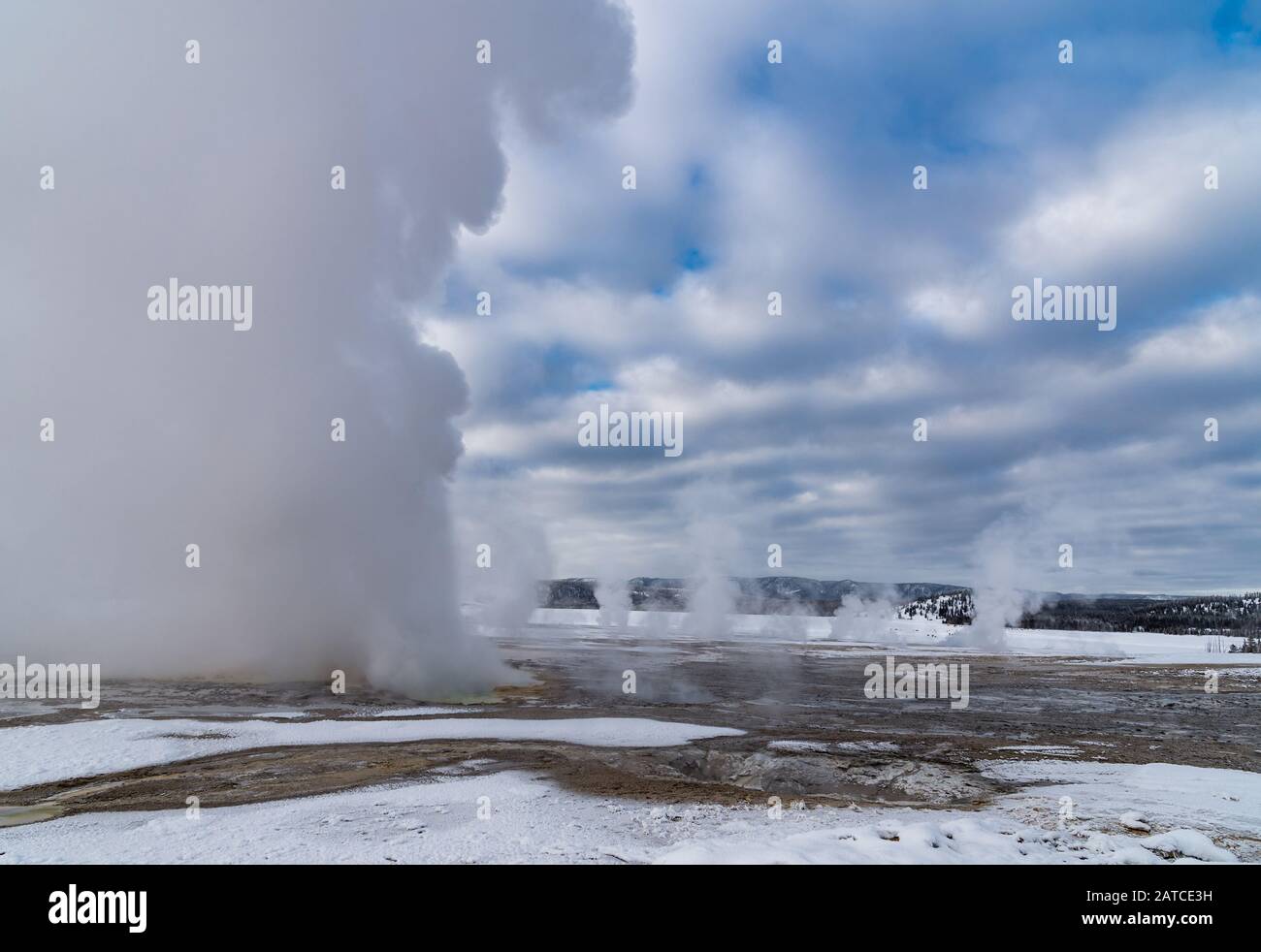 Geyser yellowstone snow hi-res stock photography and images - Alamy