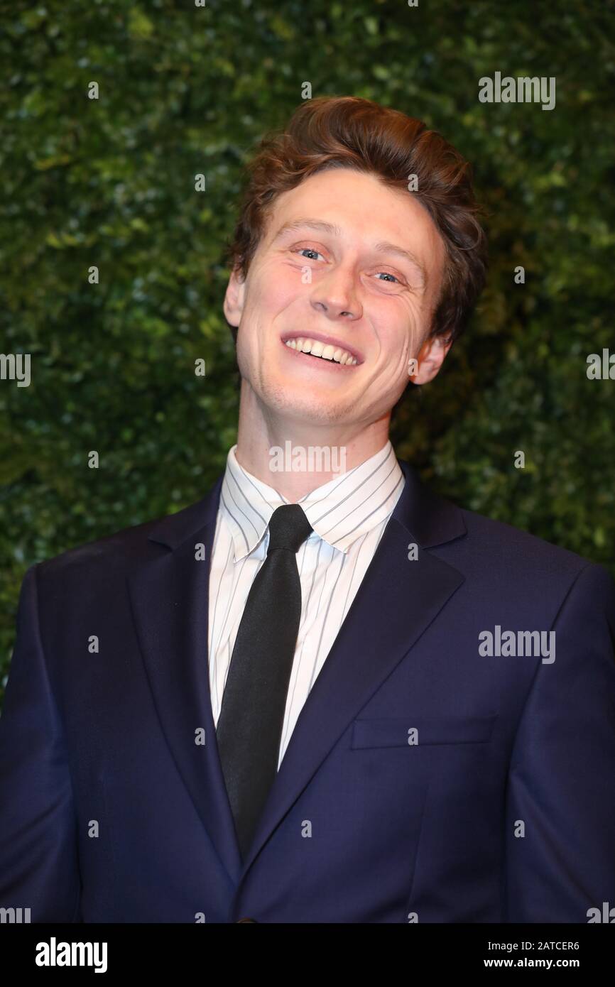 George MacKay arriving at the Charles Finch and Chanel pre-Bafta party ...