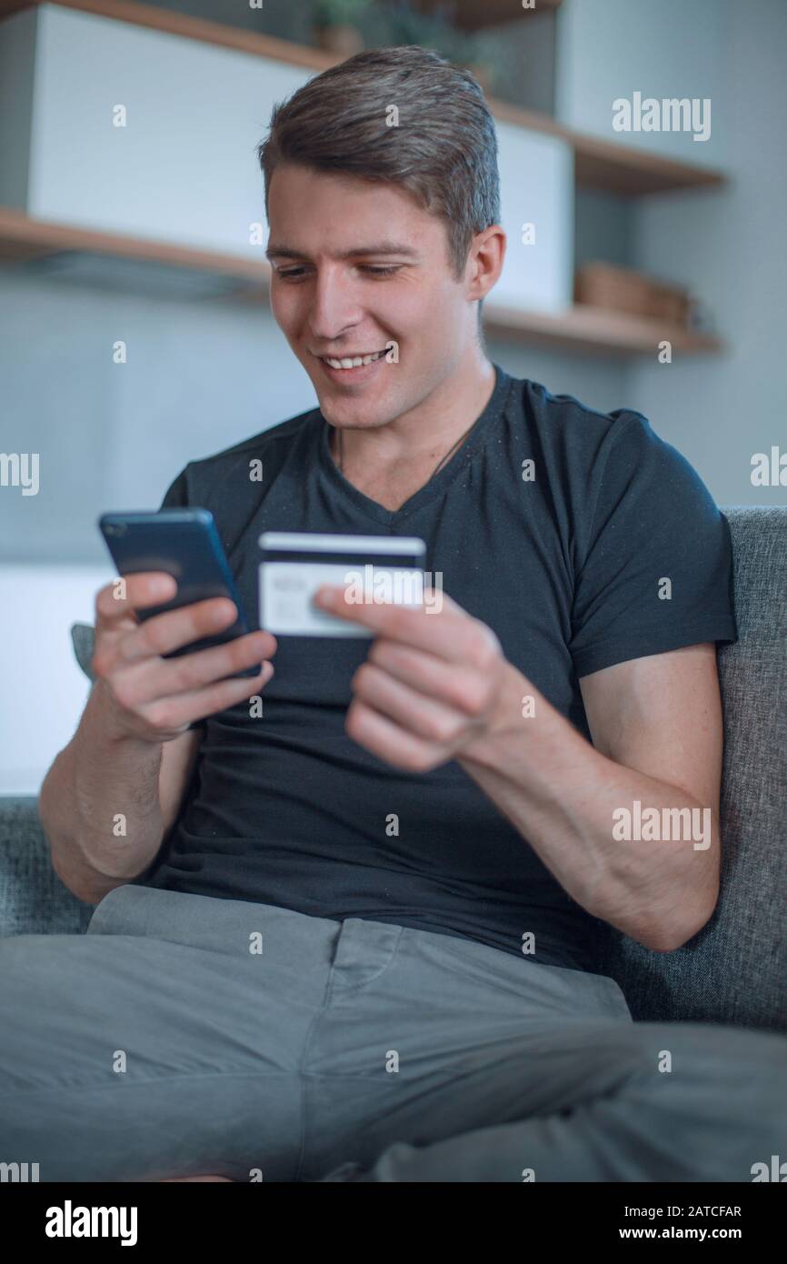 Man makes order online phone hi-res stock photography and images - Alamy