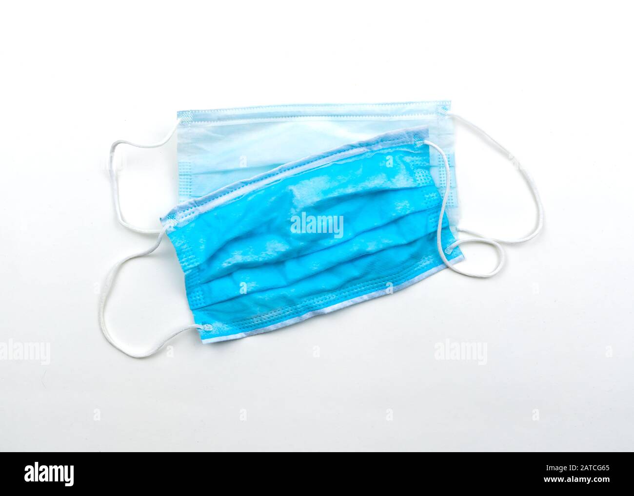 Blue medical masks hi-res stock photography and images - Alamy