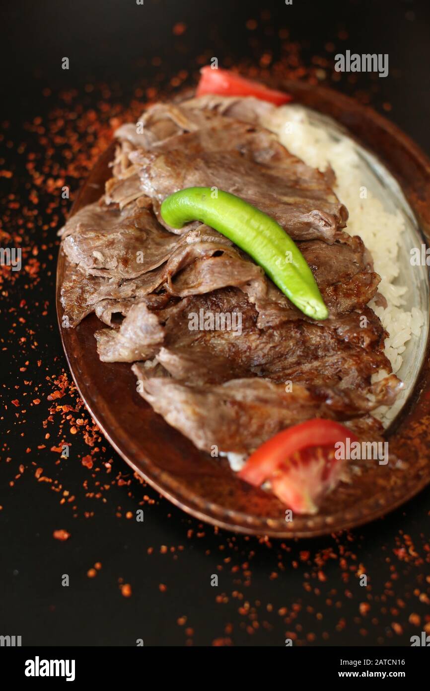 Turkish Doner Kebab with rice on the dinner plate Stock Photo - Alamy