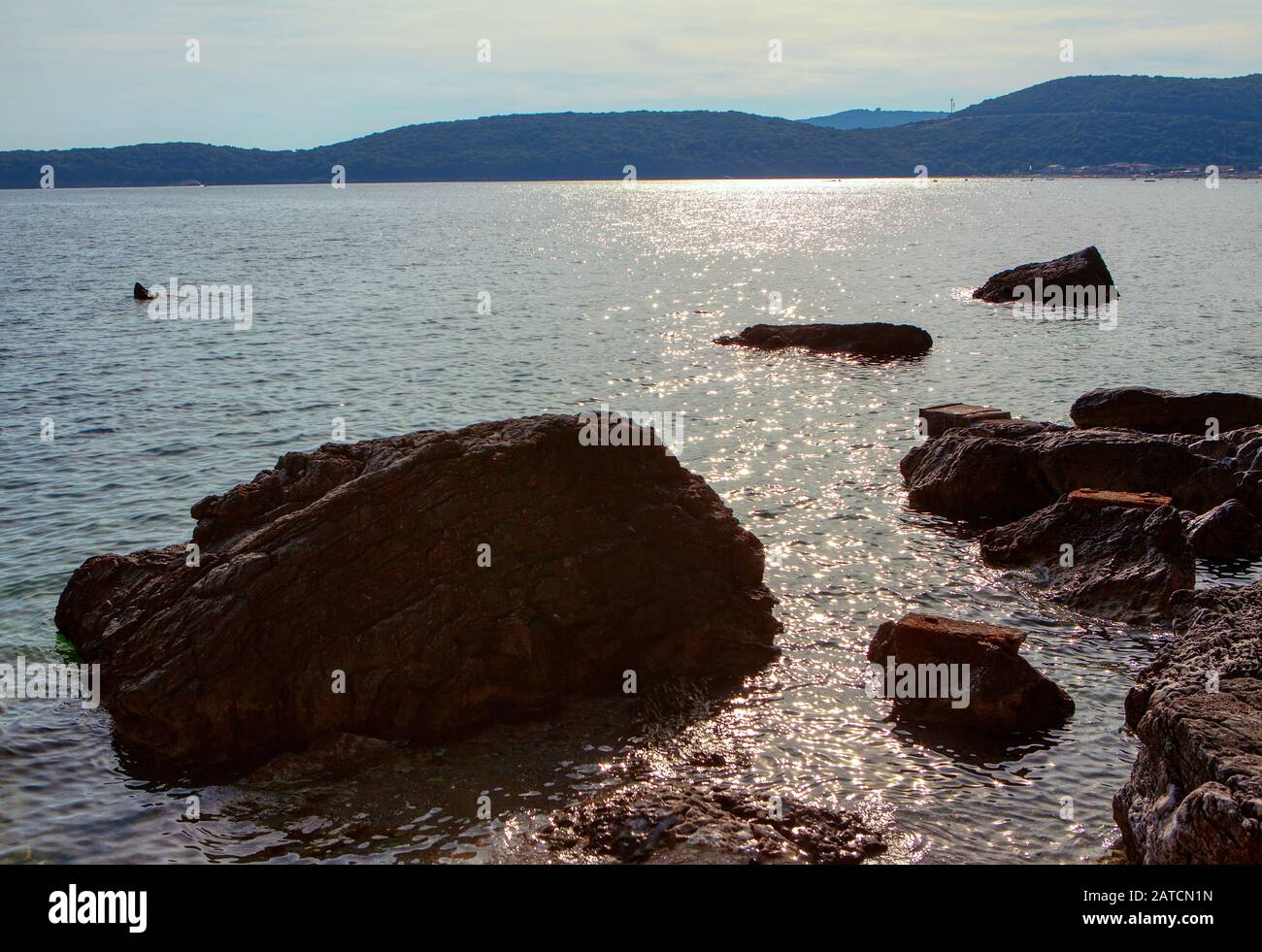big natural rocks in the sea water Stock Photo - Alamy