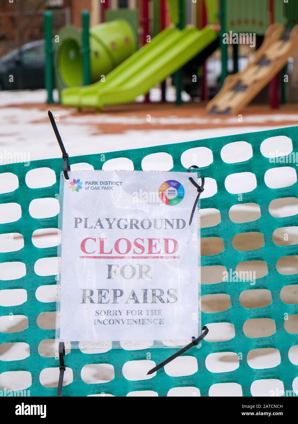 Playground closed for repair sign Stock Photo - Alamy