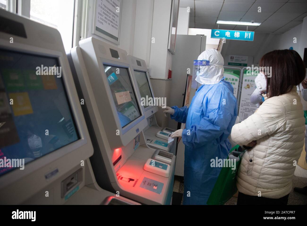 A Chinese medical worker wearing protective clothing for prevention of ...