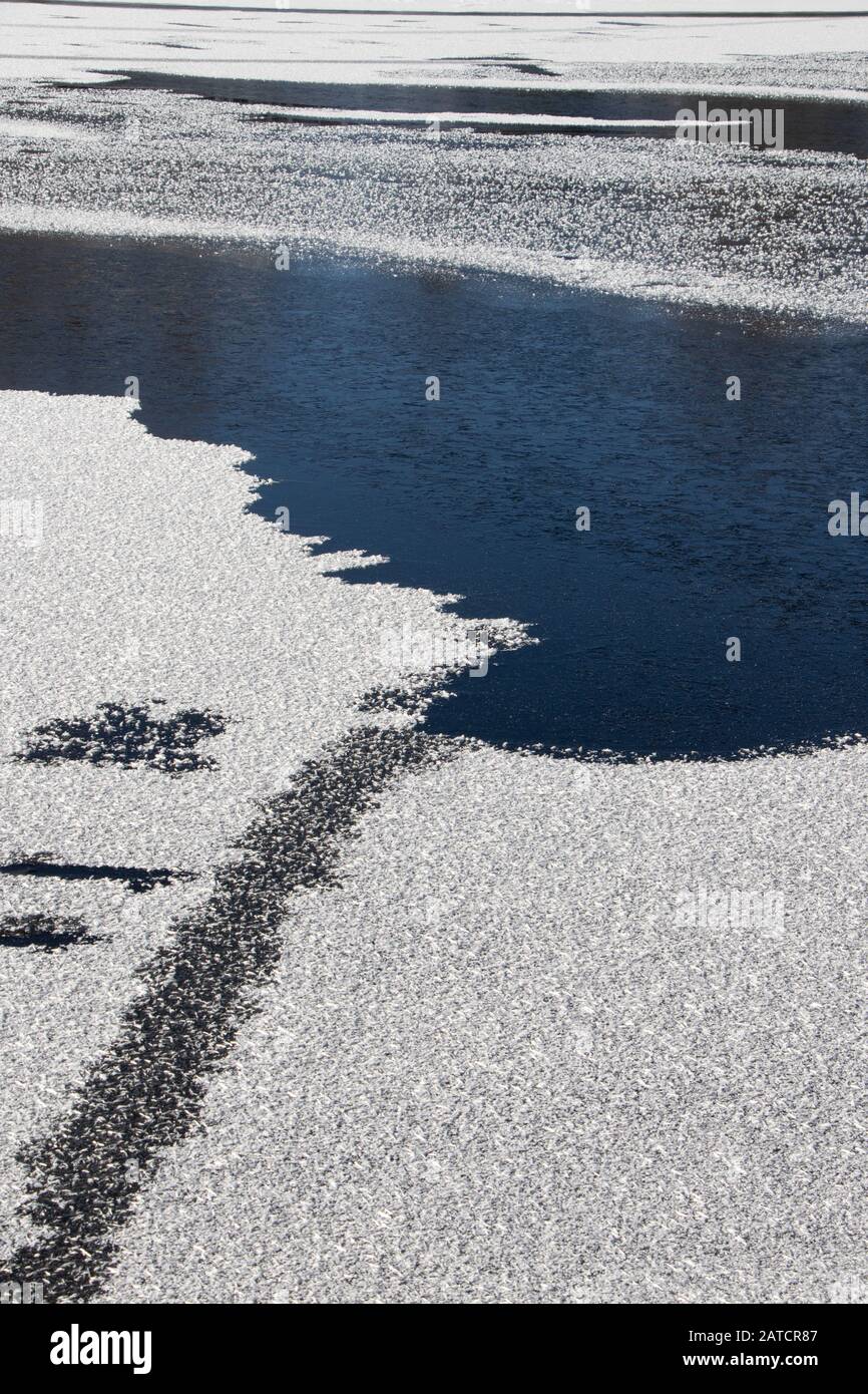 Ice and snow and frigid blue water Stock Photo - Alamy