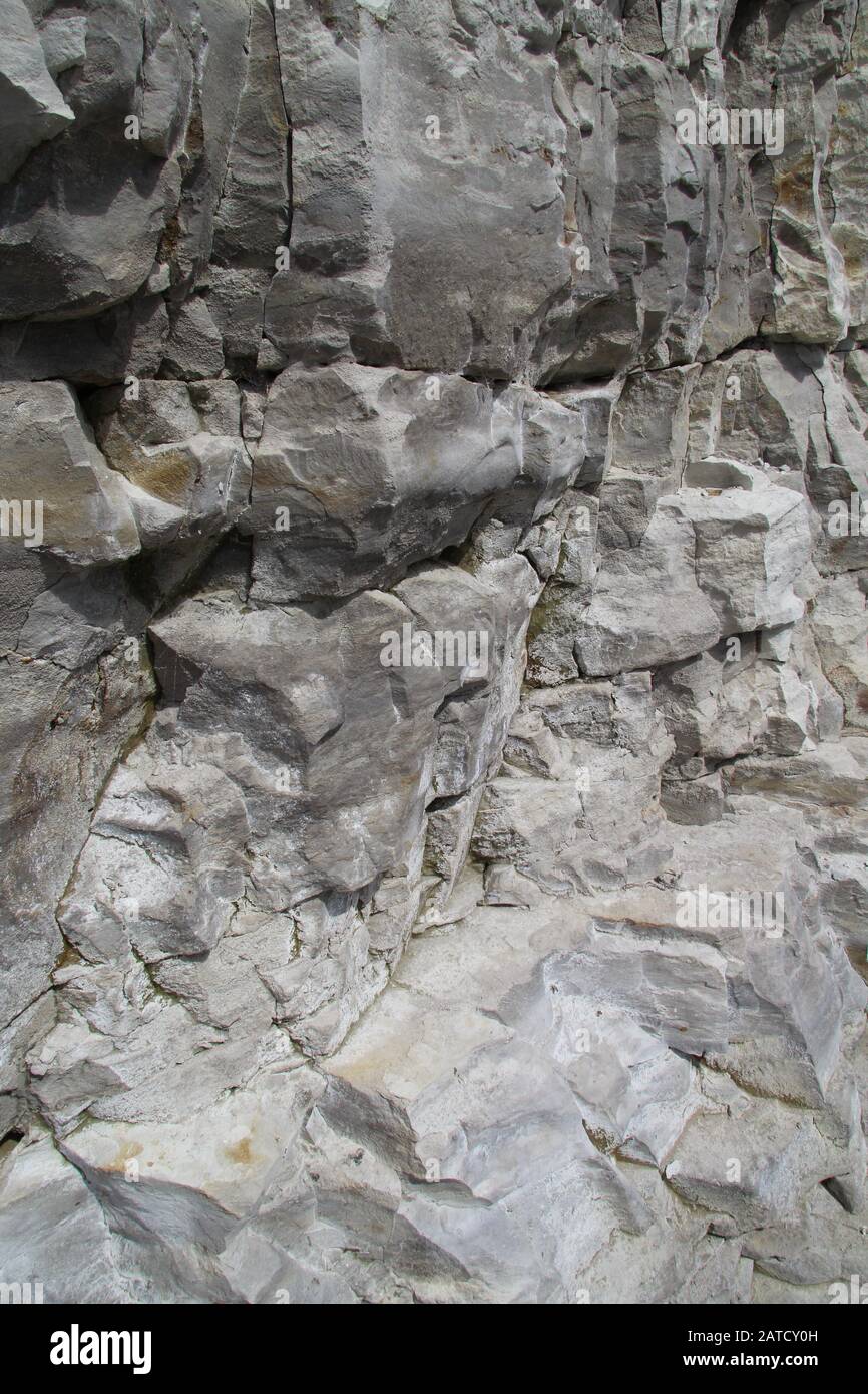 Side view of a white limestone cliff wall in Arnager, Bornholm Stock ...
