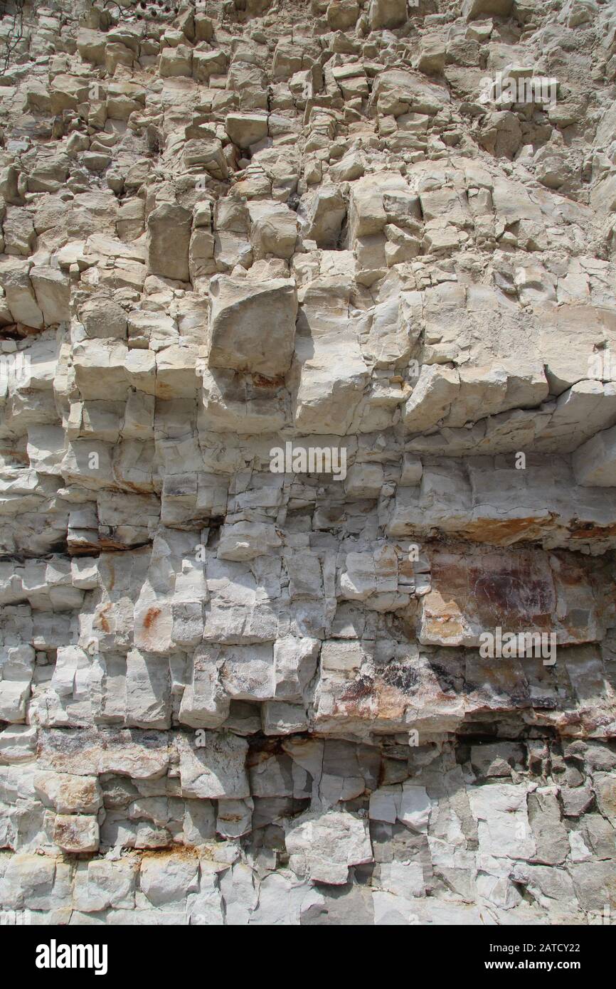 Vertical shot of a limestone cliff wall in Arnager, Bornholm Stock ...