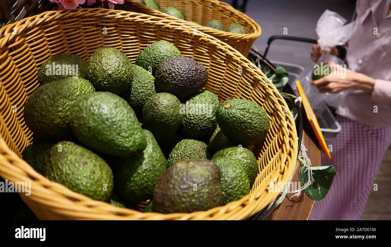 Buying avocado hi-res stock photography and images - Alamy