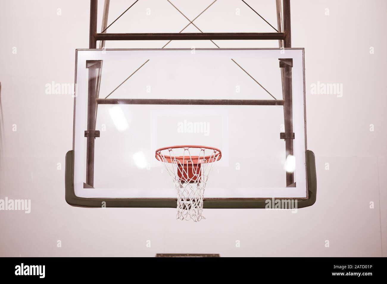 Basketball net on the basketball court with white walls Stock Photo - Alamy