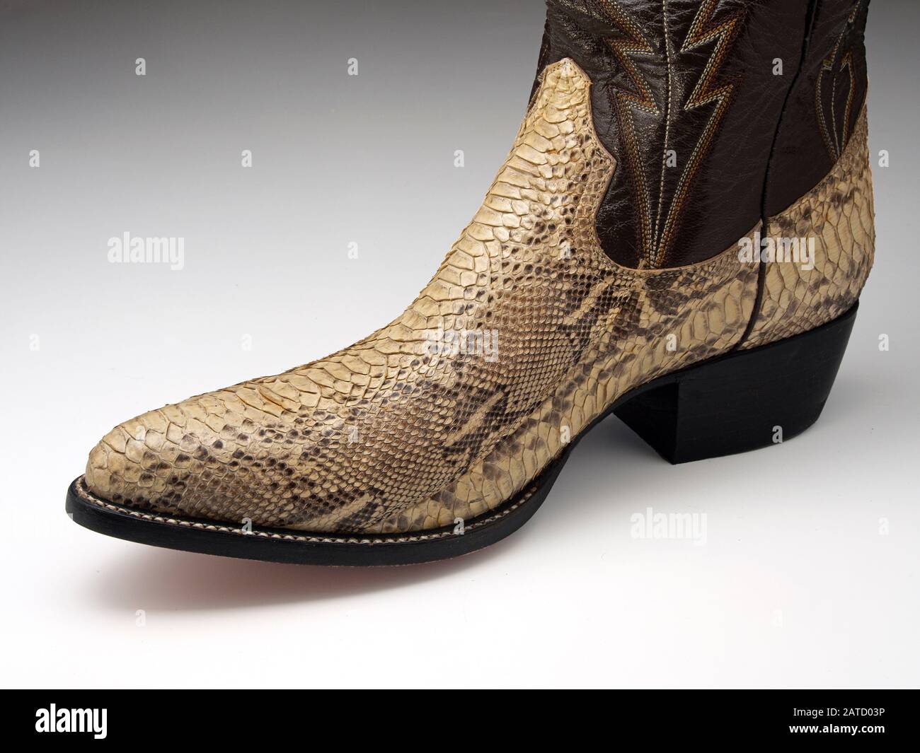 Cowboy boot made from the skin of a reticulated python (Malayopython ...