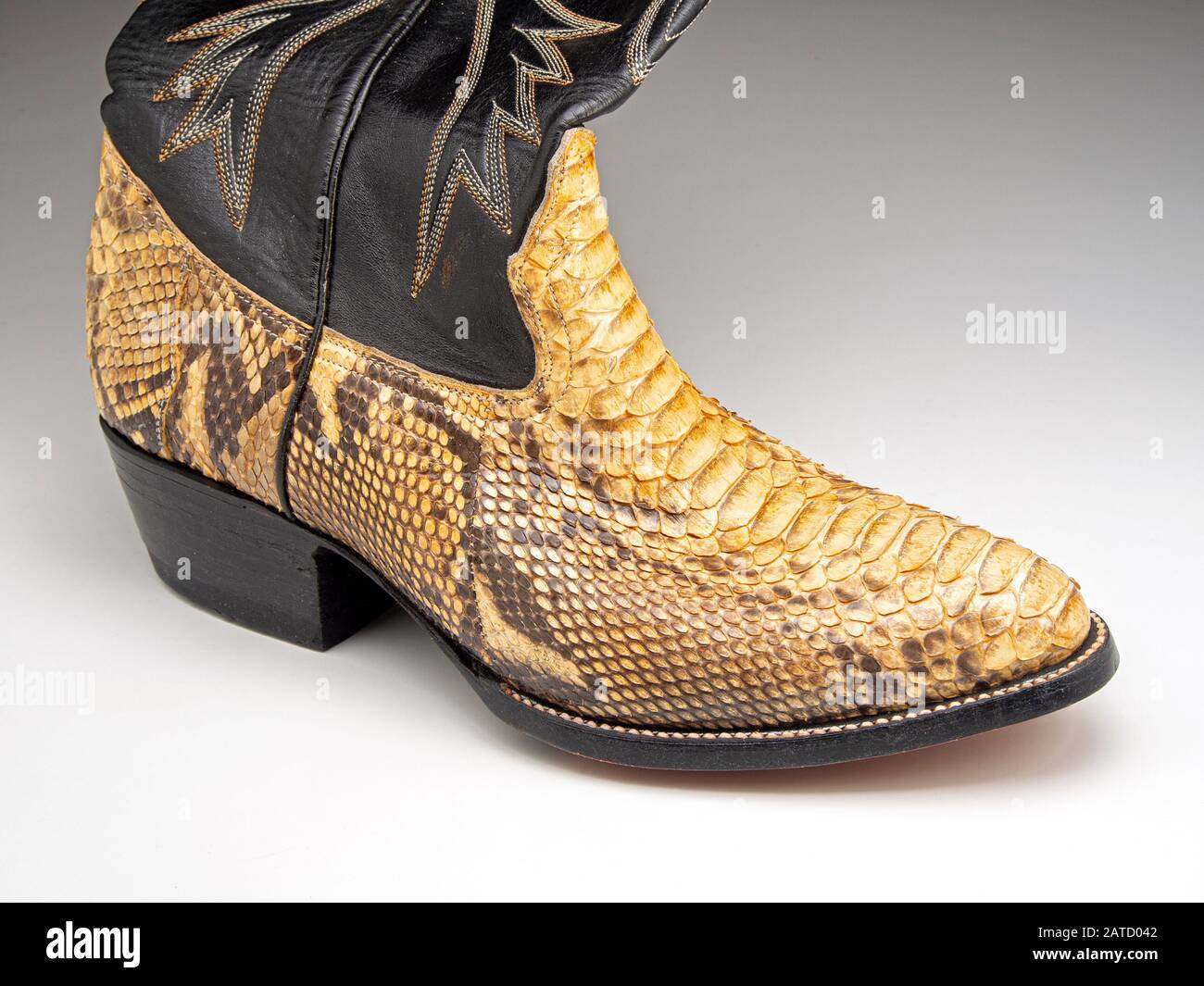 Cowboy boot made from the skin of a reticulated python (Malayopython ...