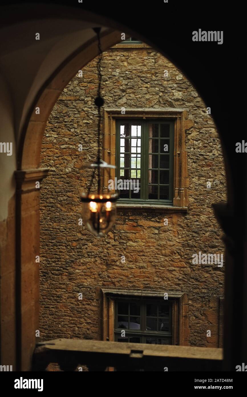 Looking through a vaulted arched window into the central courtyard ...