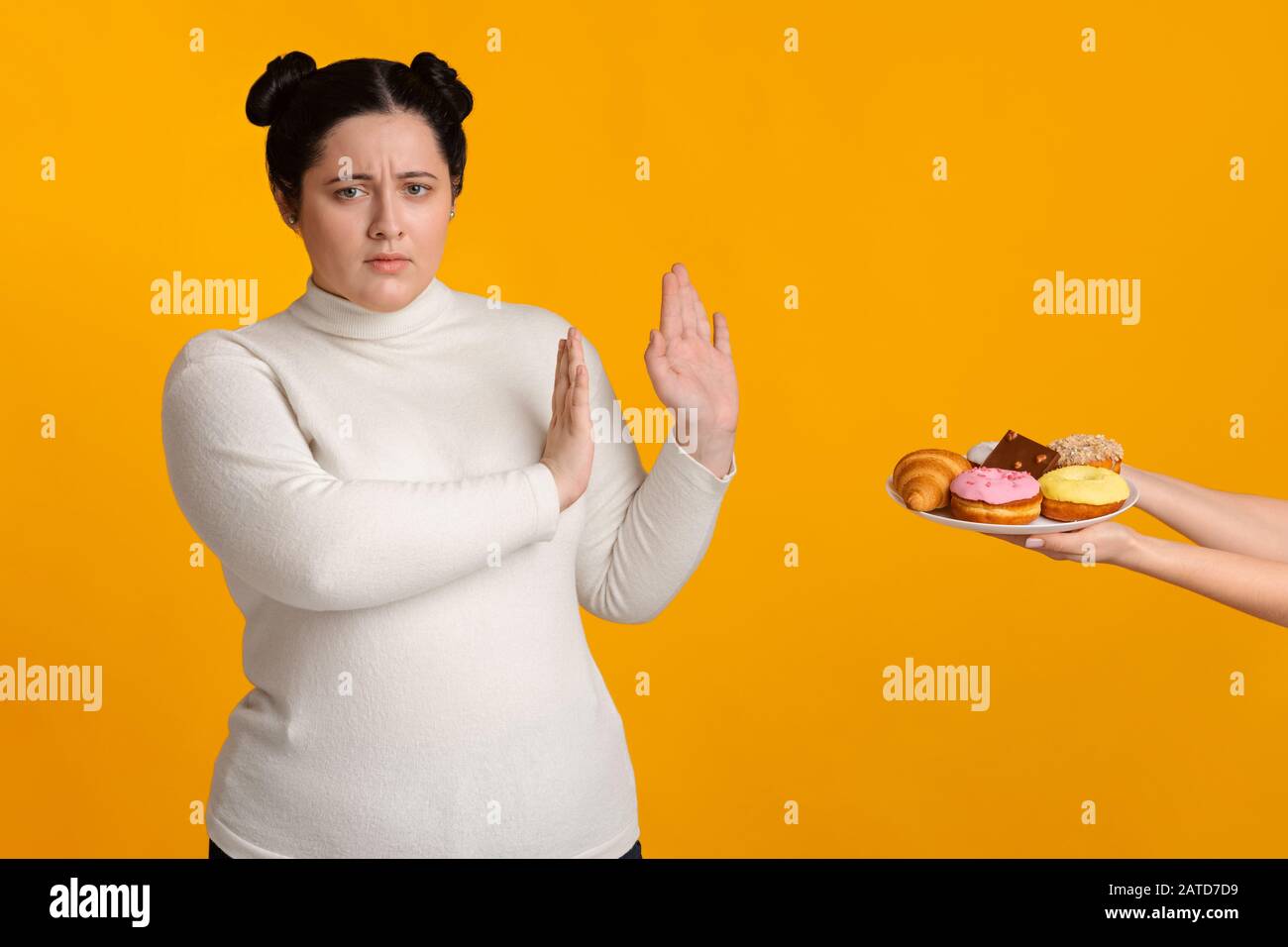 Refusing Sweets High Resolution Stock Photography and Images - Alamy