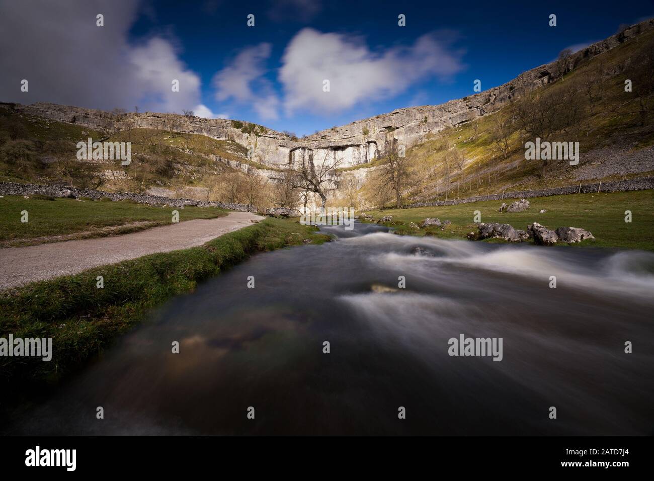 Malham Cove is a large curved limestone formation 0.6 miles north of ...