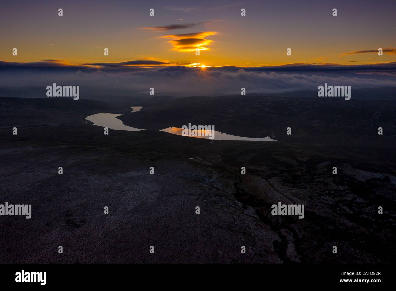 Mist rises from sunset Stock Photo - Alamy