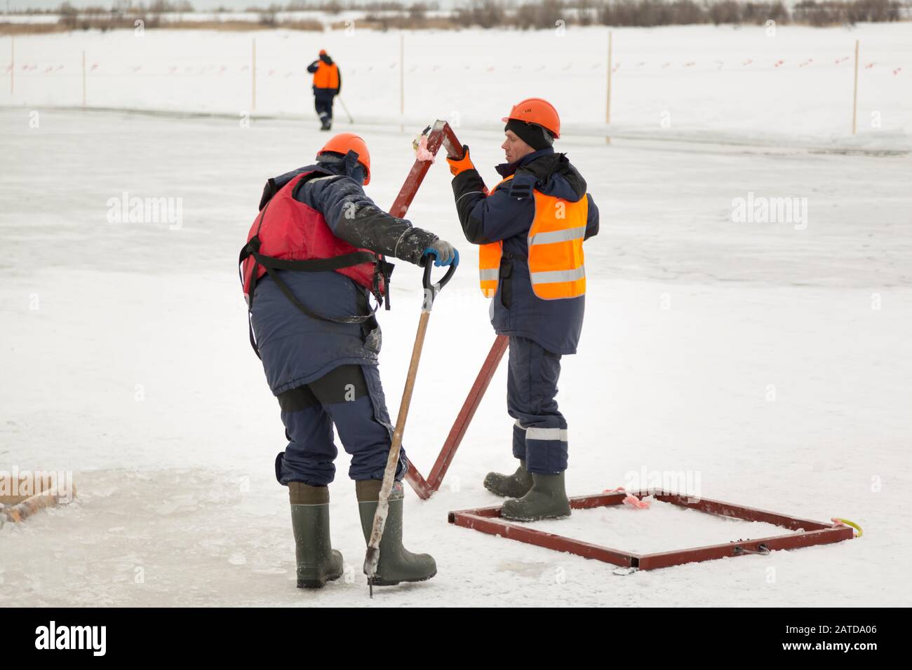 Two workers at the site of the ice camp Stock Photo - Alamy
