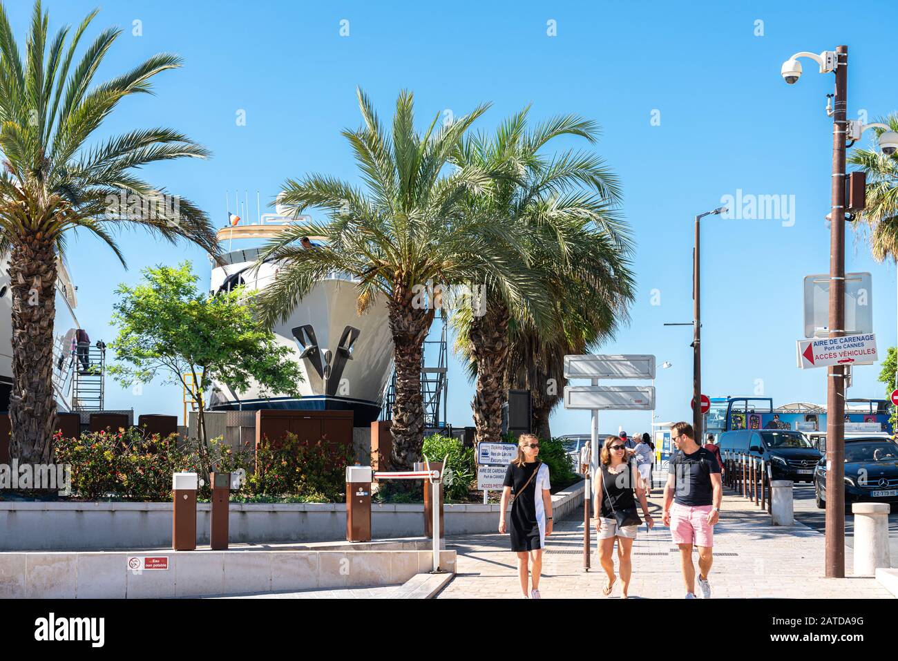 CANNES, FRANCE - JUNE 01, 2019: People Walking Near Luxurious Yachts ...