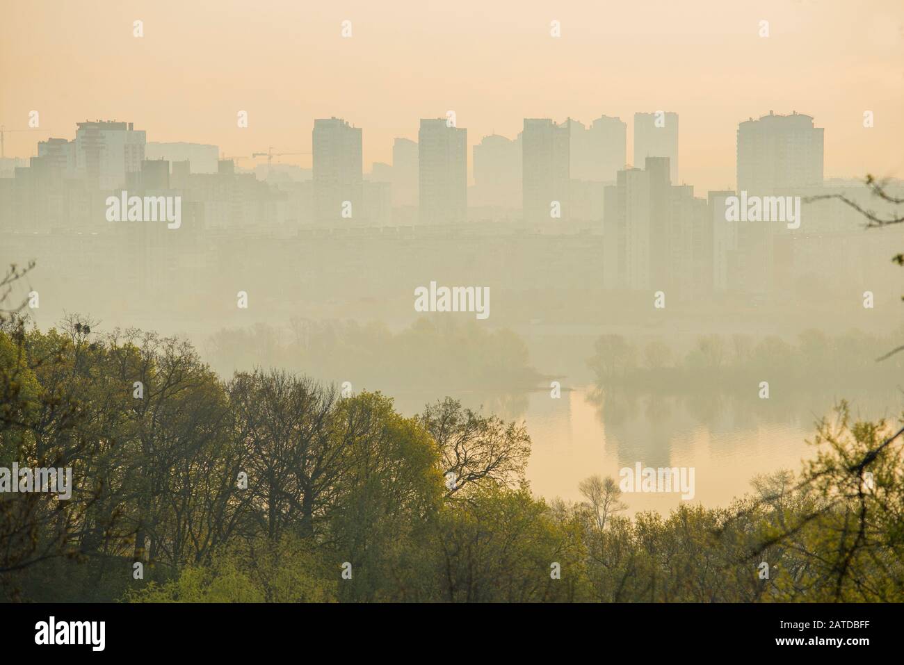 A view of Kyiv, at sunrise, with silhouettes of the left bank ...