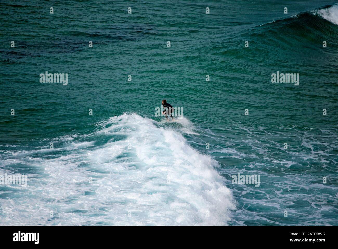 Alone boarder surfing on wave Stock Photo - Alamy