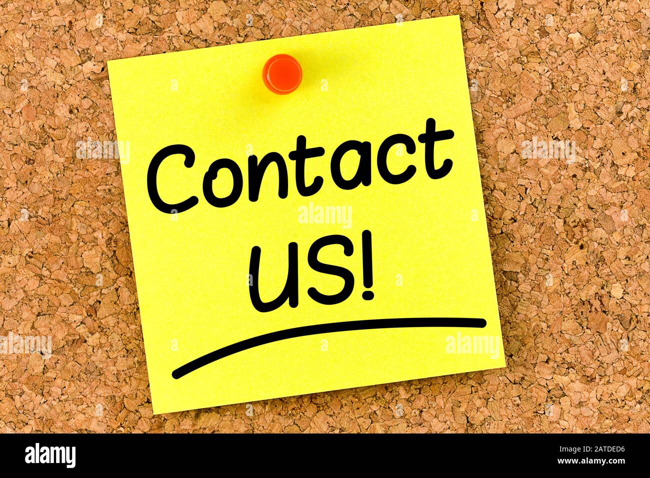 closeup post it note on corkboard with contact us message on it Stock ...