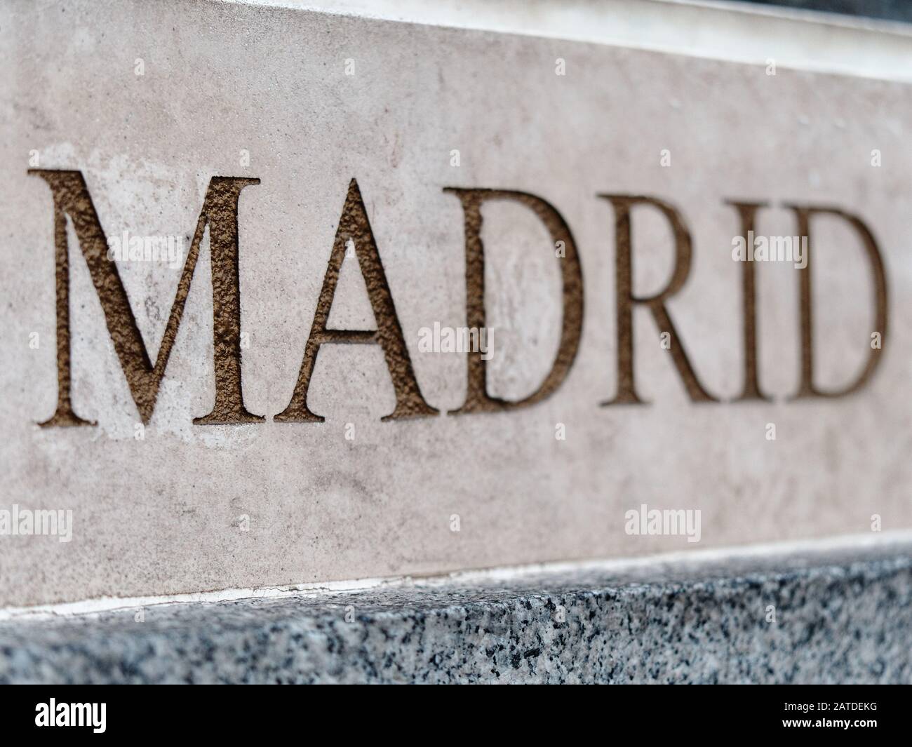 Madrid text engraved in the marble perspective view Stock Photo - Alamy