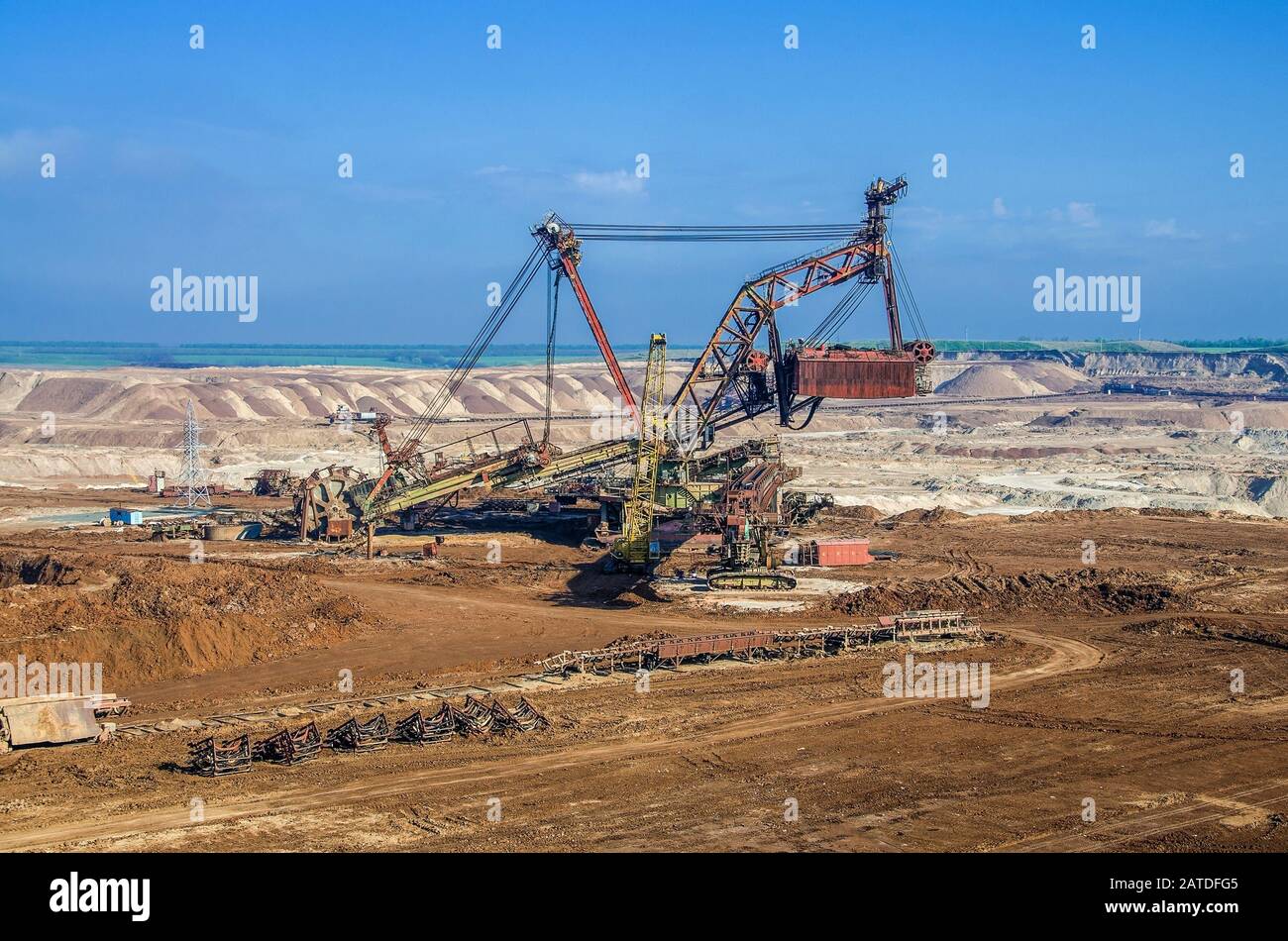 Large appliances excavators in open pit, develop mineral resources ...