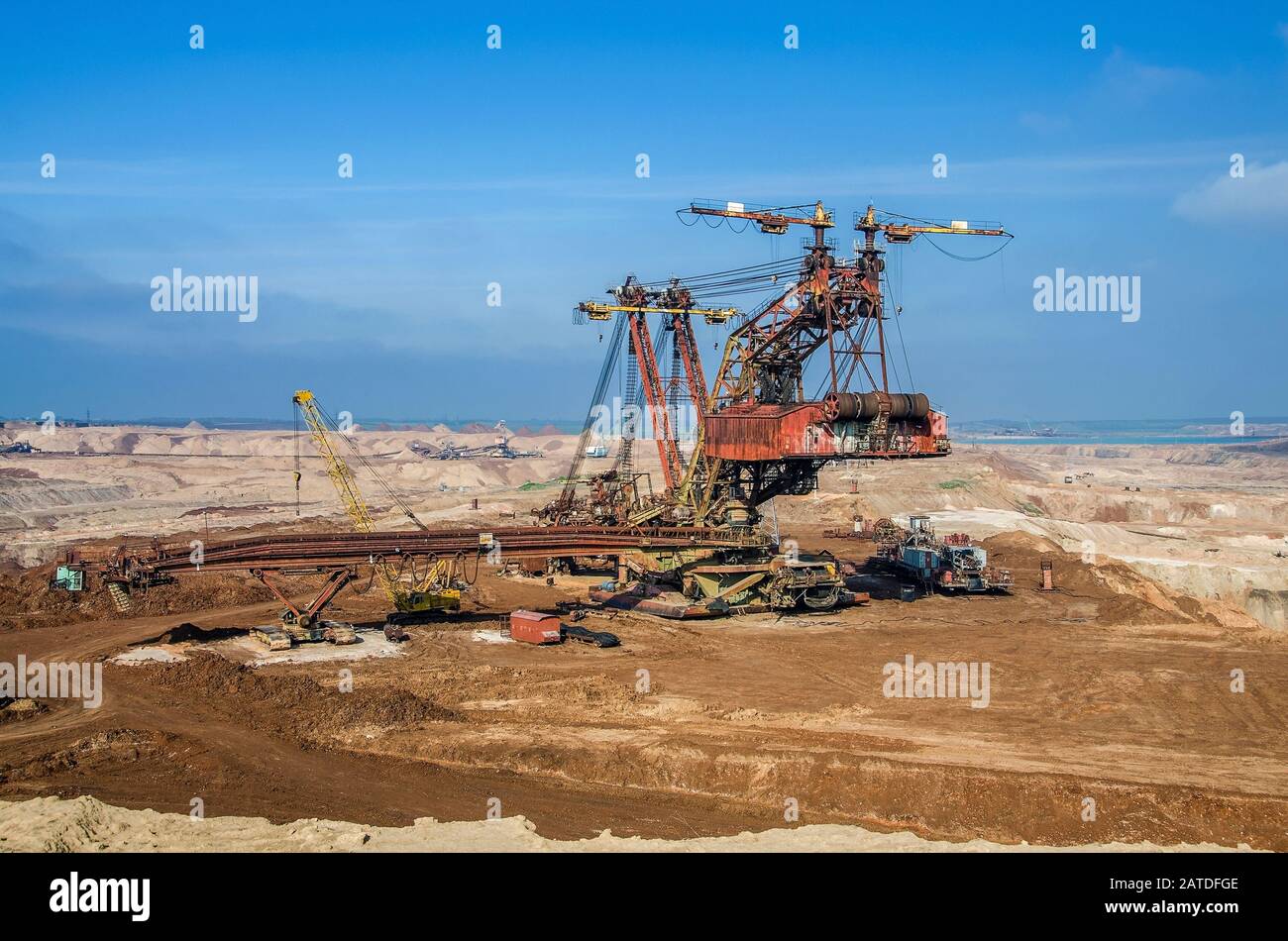 Large appliances excavators in open pit, develop mineral resources ...