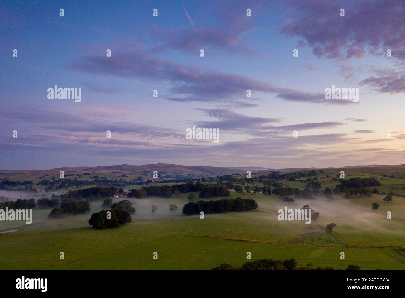 Sunrise over farmland near the Yorkshire Dales village of Eshton a ...