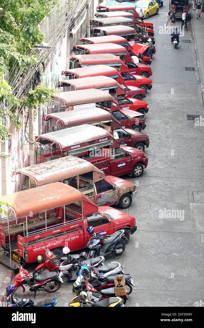 red car taxis communal Stock Photo - Alamy