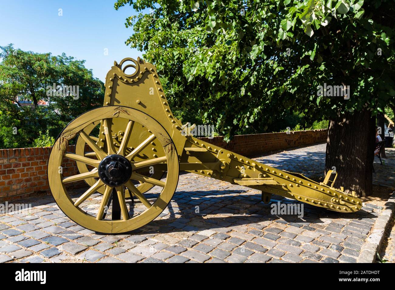 Old fashioned gun carriage, brown with wooden wheels Stock Photo - Alamy