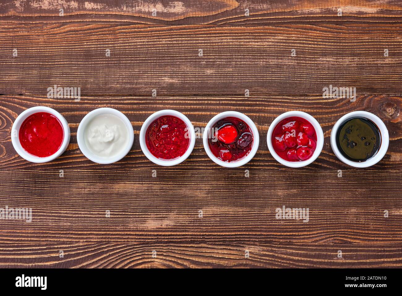 Overhead view of assortment of fruit puree. Jam, confiture, chutney or ...