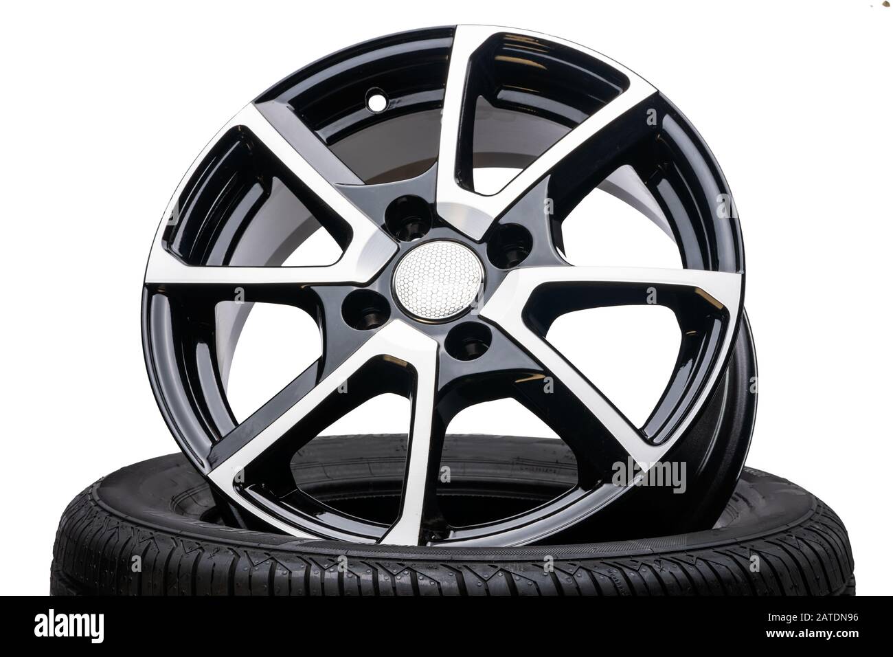 cast aluminum disc alloy wheel closeup on white background. Isolate ...