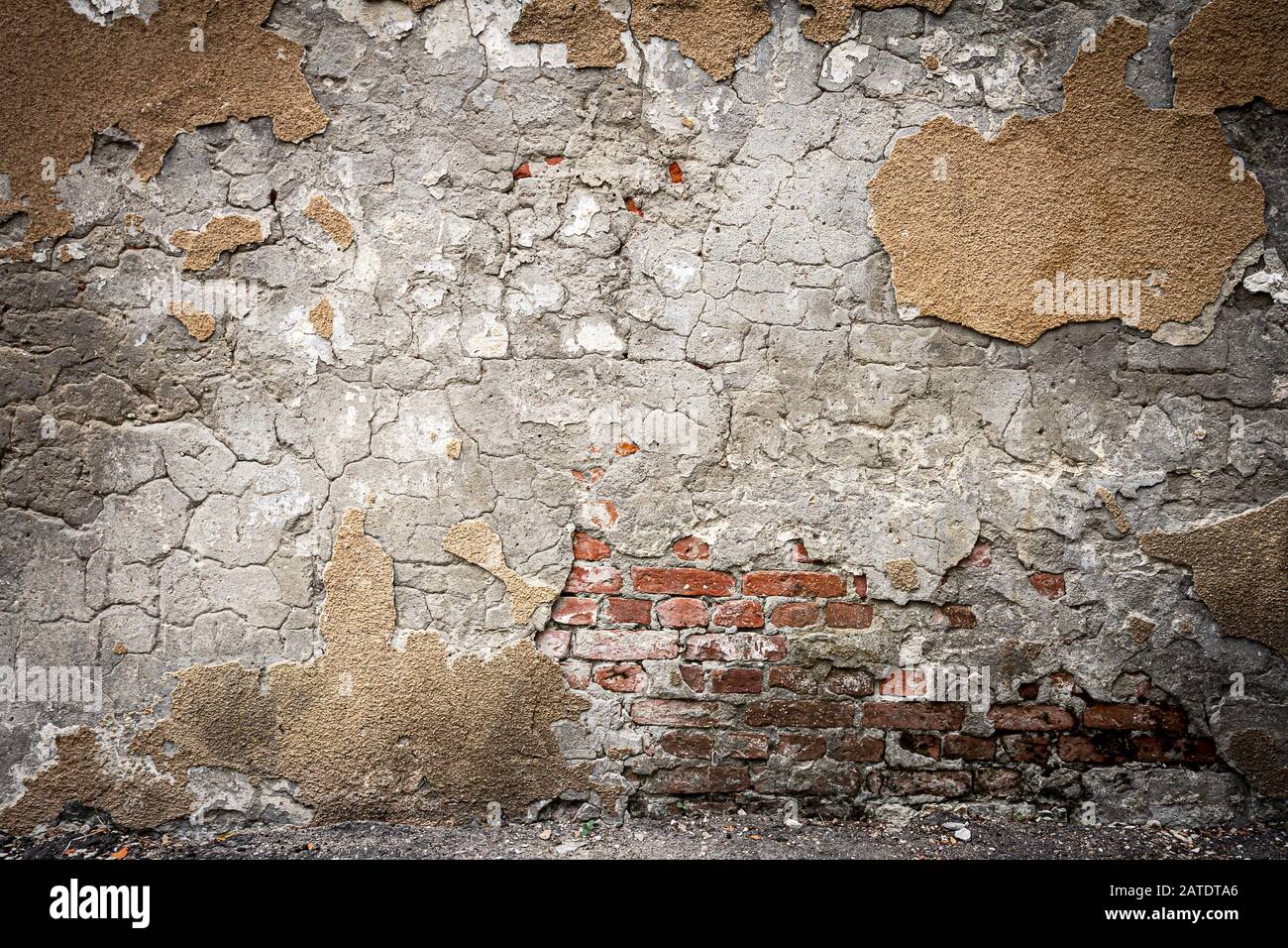 Old weathered wall of plaster and bricks and a ground Stock Photo - Alamy