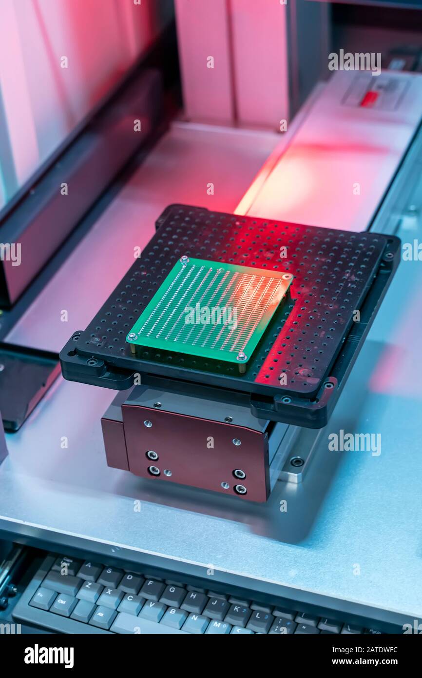 PCB Processing on machine working in factory Stock Photo - Alamy