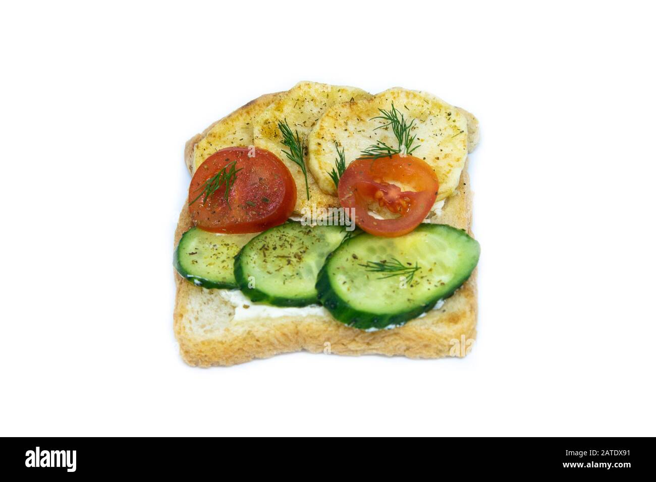 Sandwich with potatoes, gurtz and tomatoes isolated on a white ...