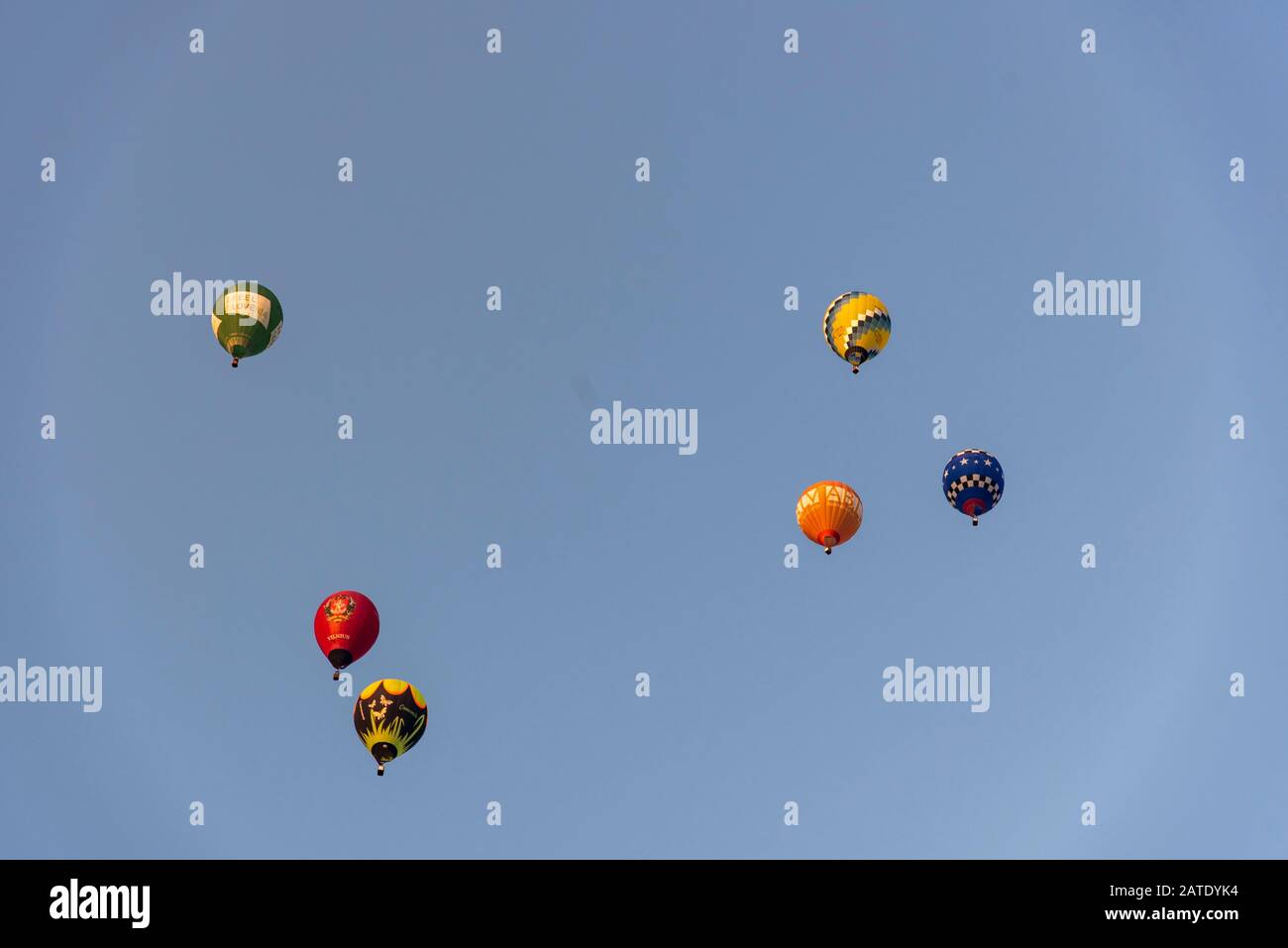 Colored Baloons Fly Away In Crystal Clear Light Blue Sky Stock Photo ...