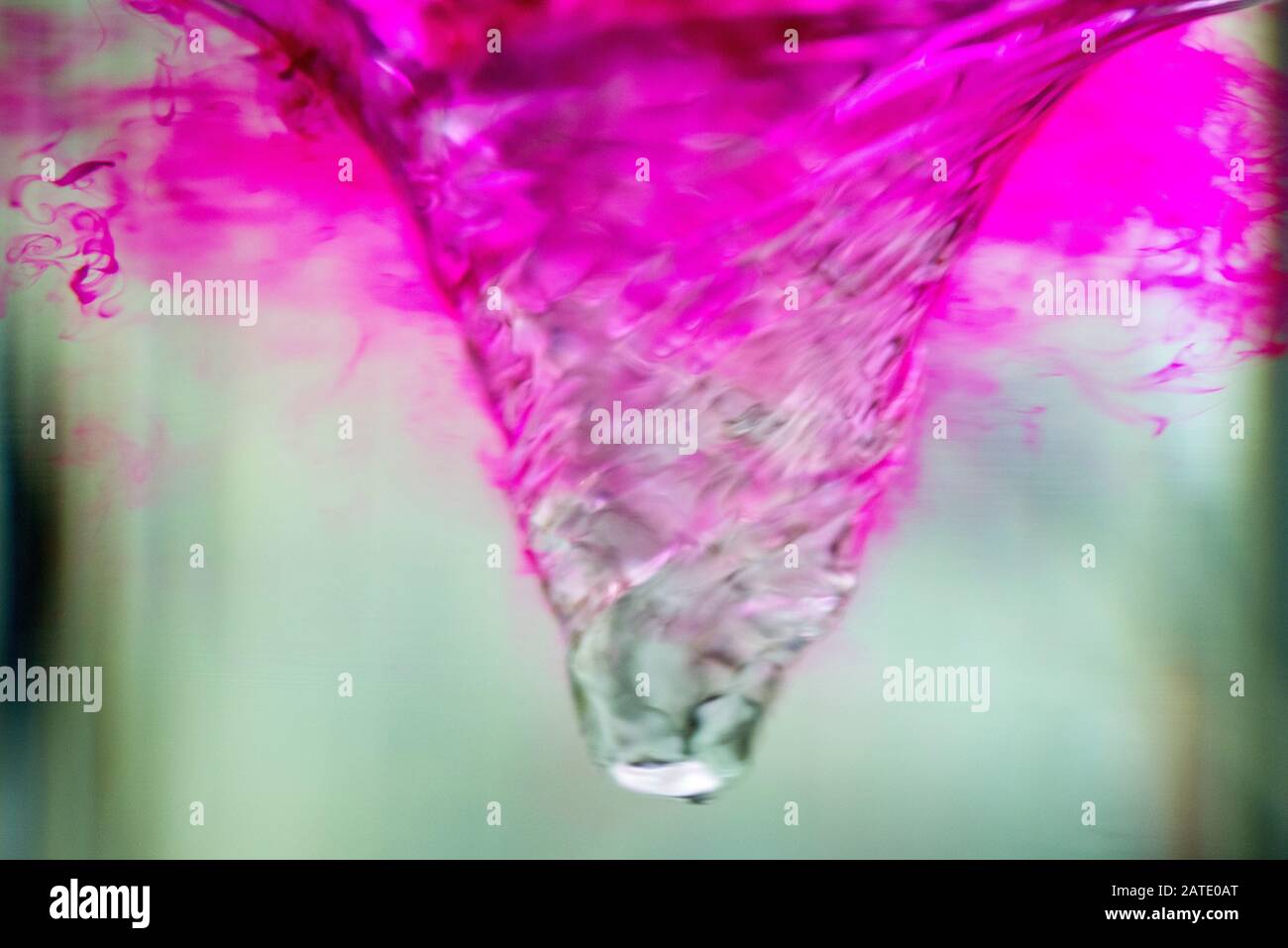 water vortex mixing dye in a glass beaker Stock Photo - Alamy