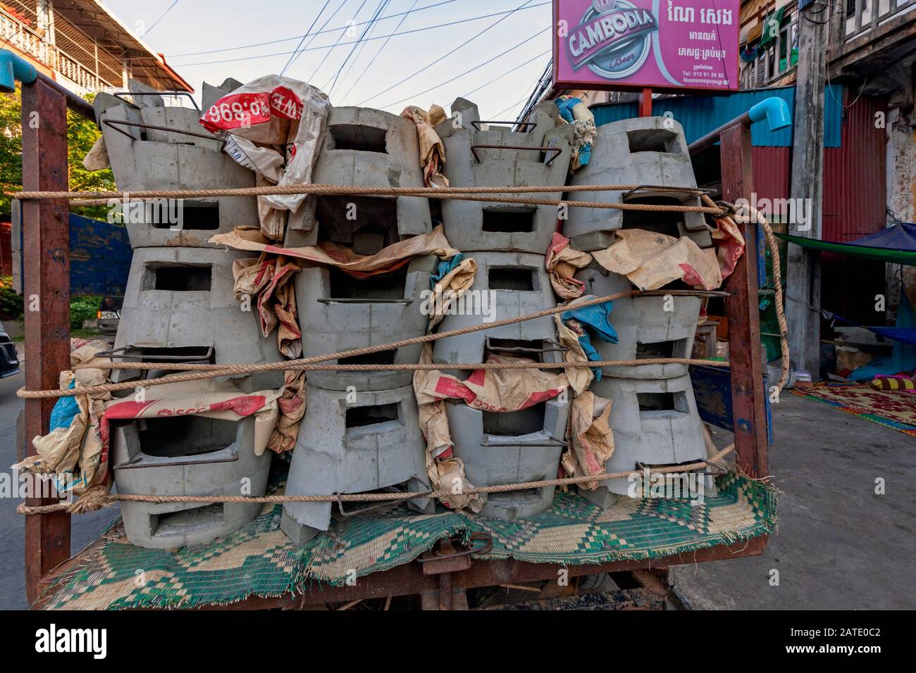 A truck loaded with a large & heavy load of wood and coal burning ...