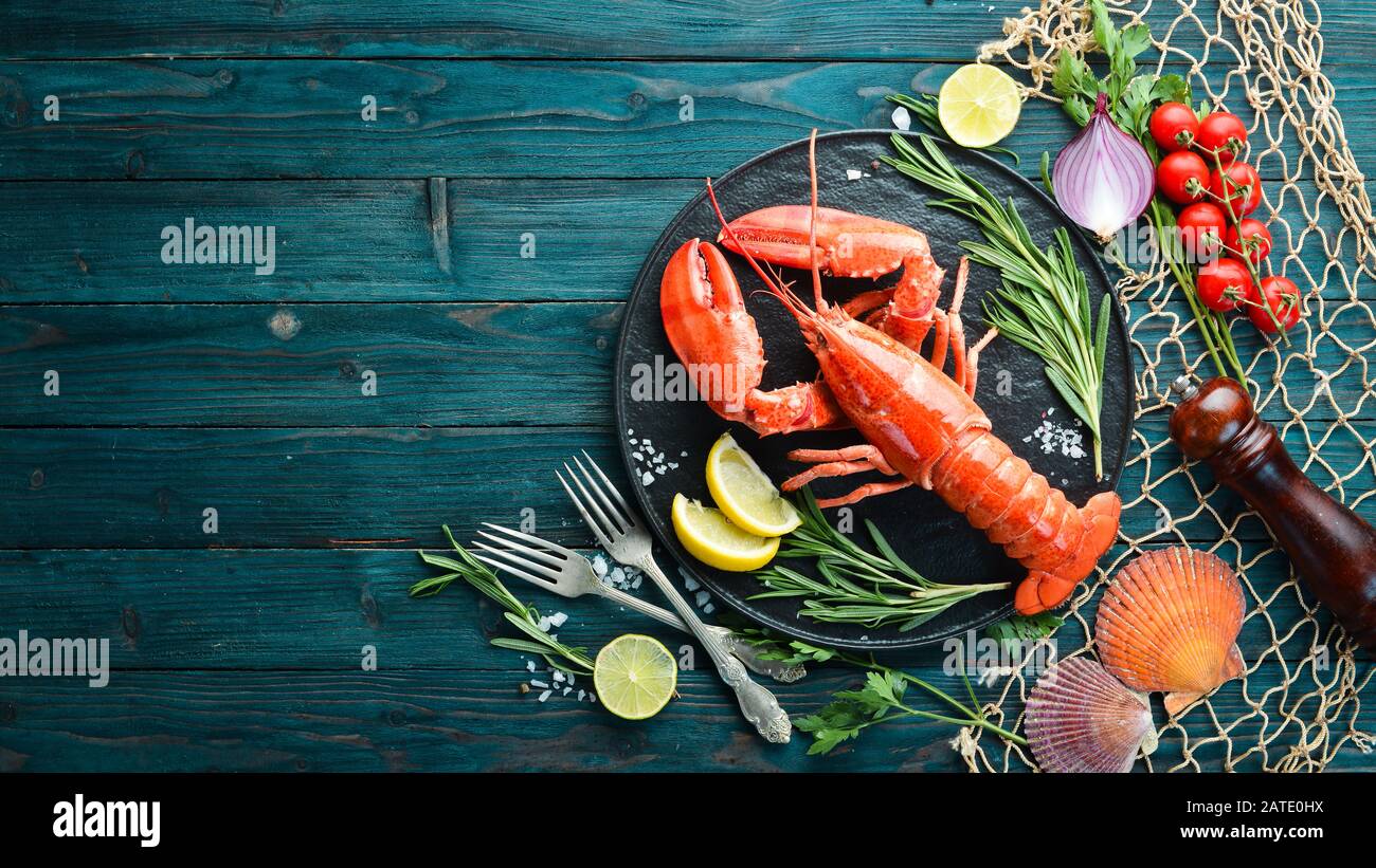 Seafood on a blue background. Lobster. Top view. Free copy space Stock ...