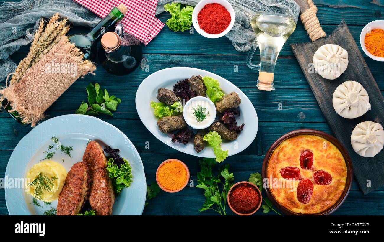 Assortment of dishes of Georgian and European cuisine. On the old ...