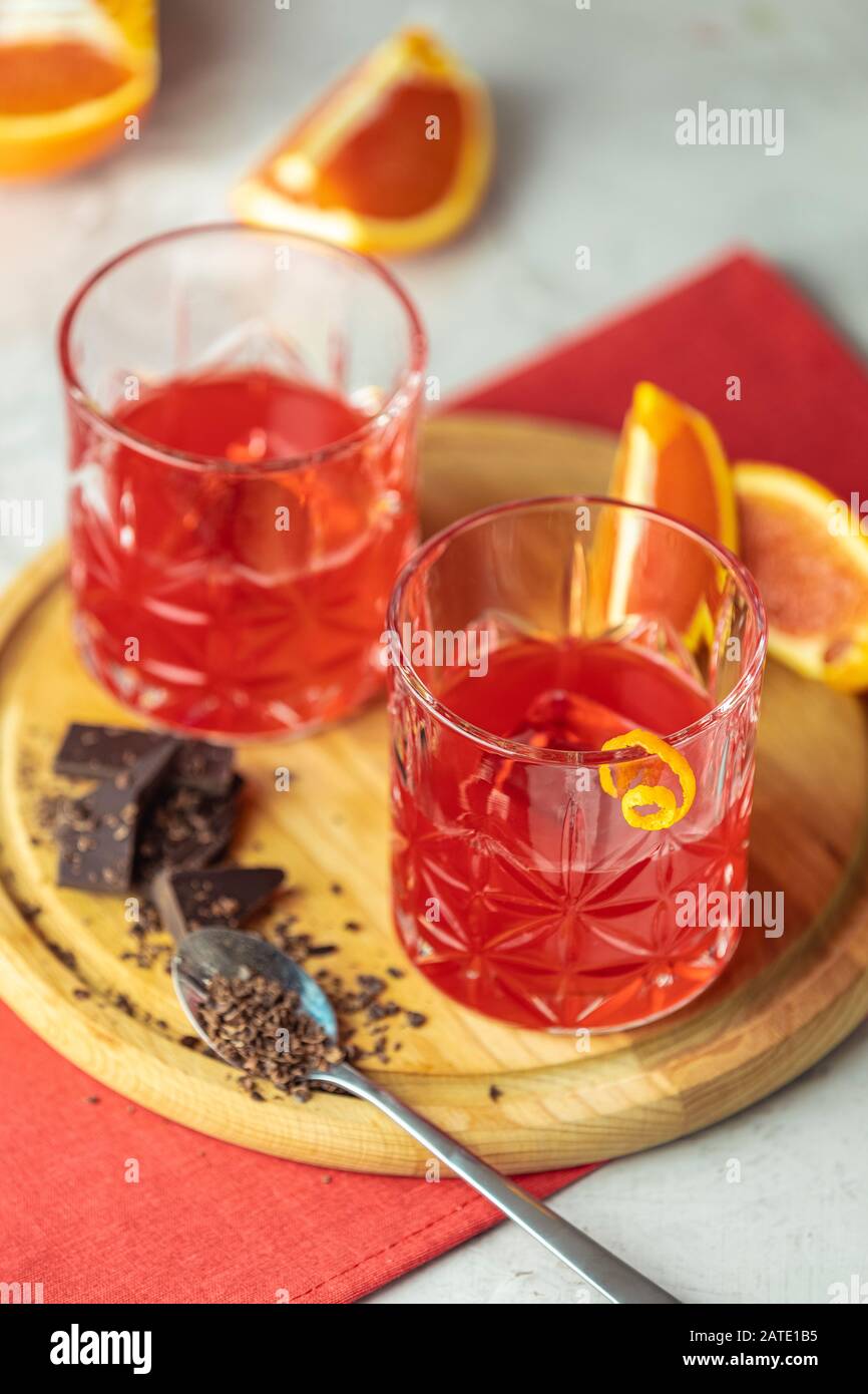 Two glasses of chocolate red orange negroni, an italian cocktail, an ...