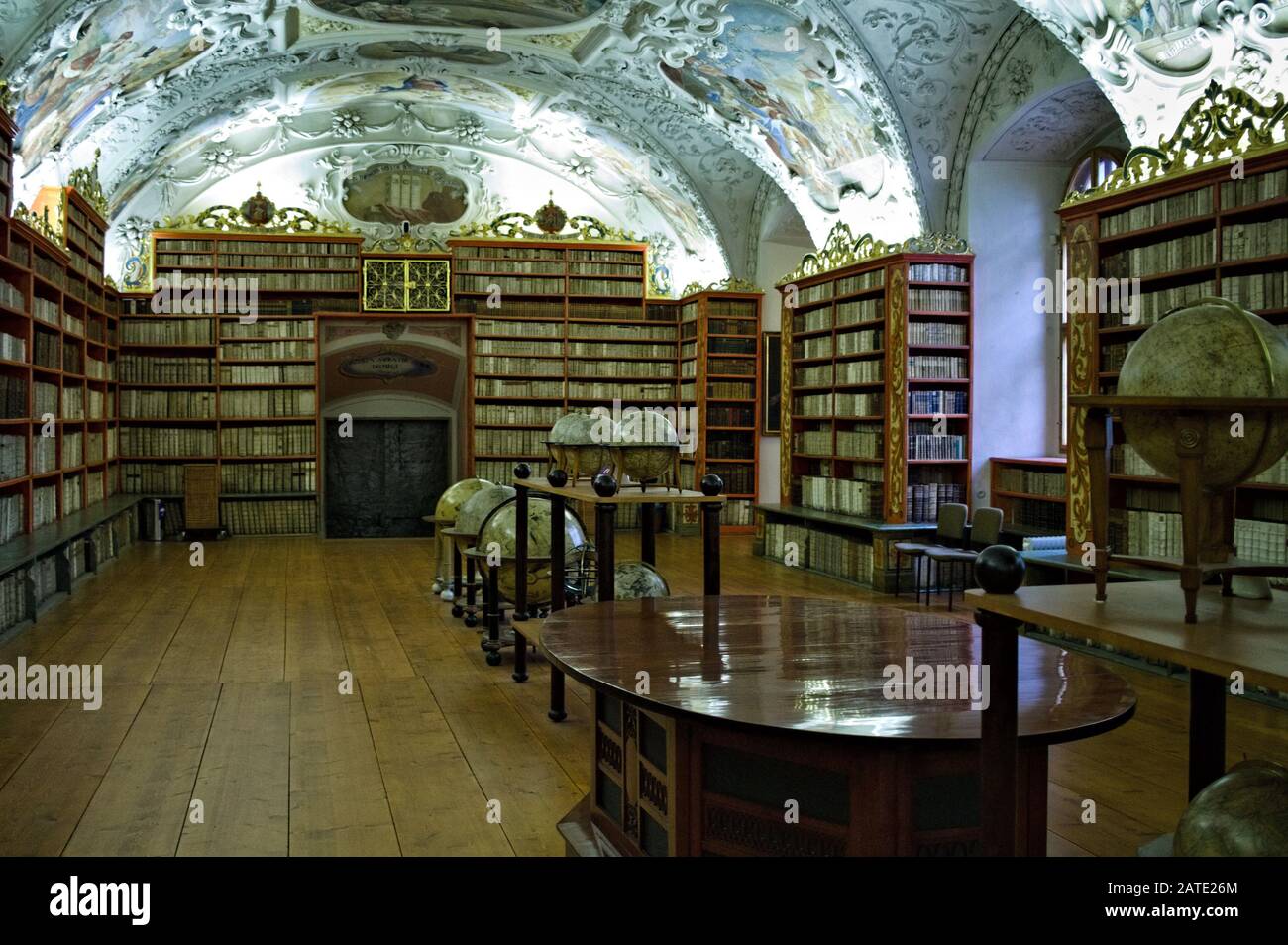 Prague, Czech Republic - 30 December 2019: old library with globes and ...