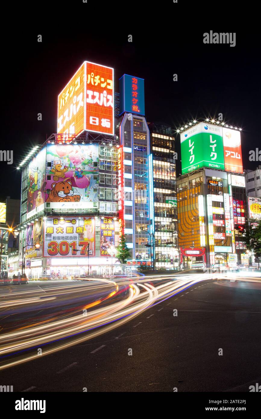 TOKYO, JAPAN - 27th June 2016. Busy street corner in th evening. 4 ...